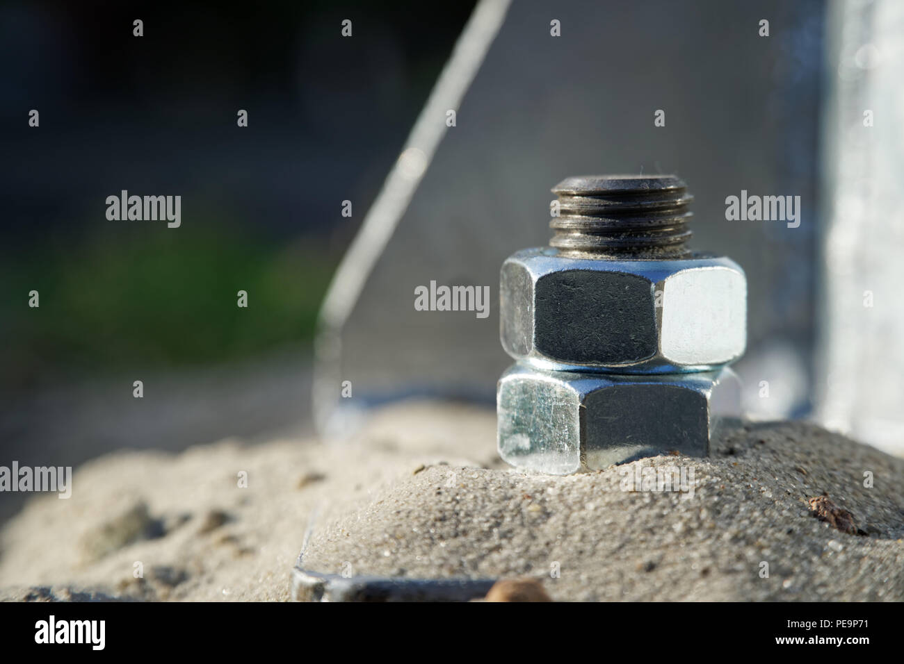 Steel silver bolt fasten iron post, industrial background Stock Photo ...
