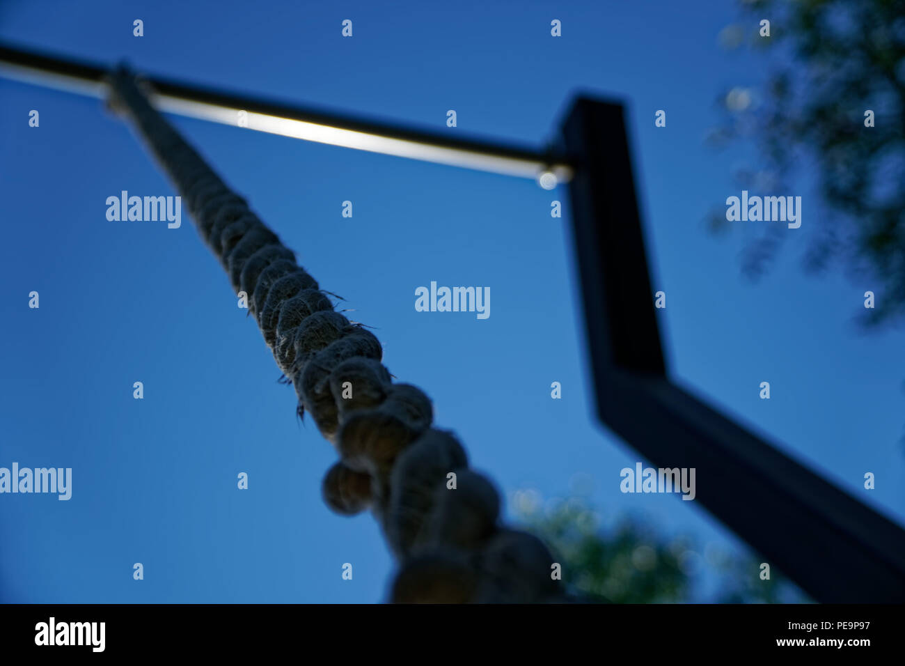 Rope closeup - Thick coiled rope with knot, sportive background Stock ...