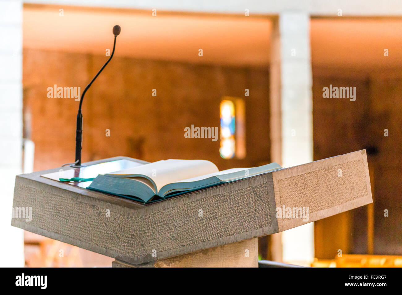 Open Gospel book above Lectern Stock Photo - Alamy