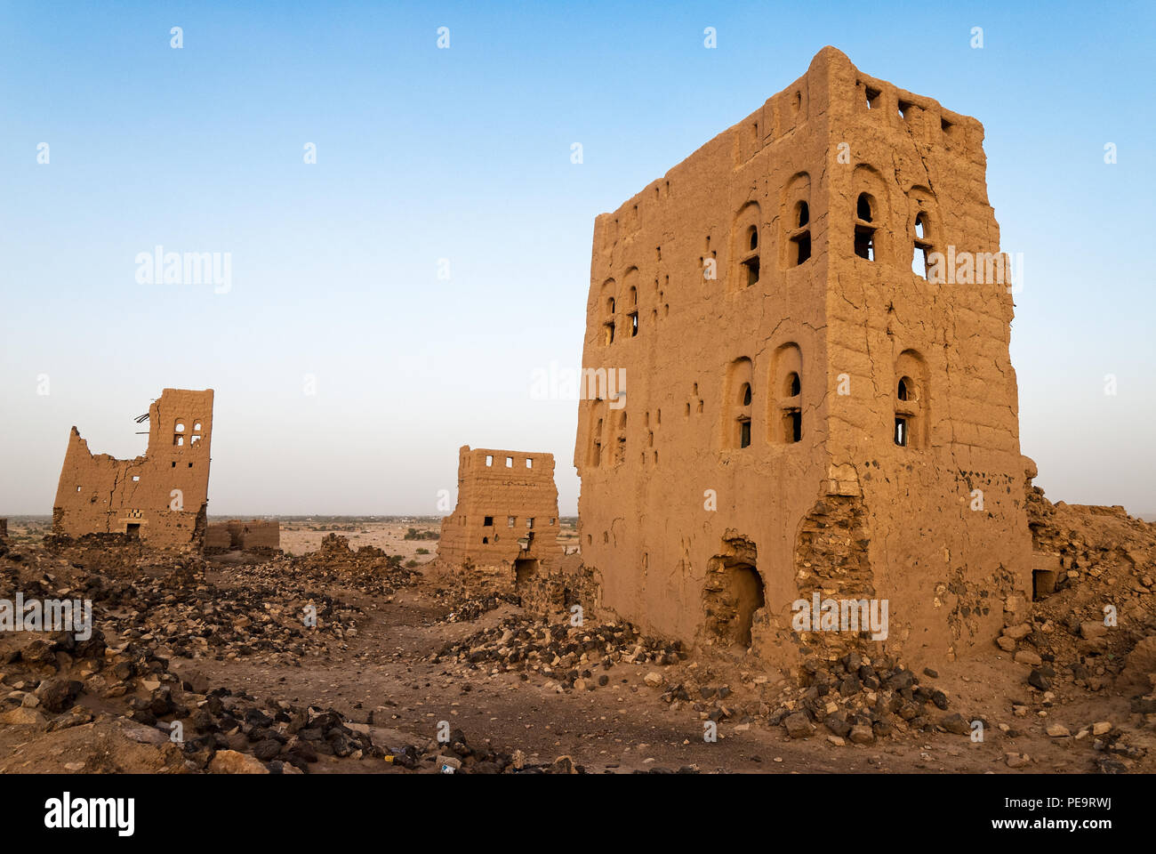 Ruined multi-storey buildings made of mud in the district of Marib ...