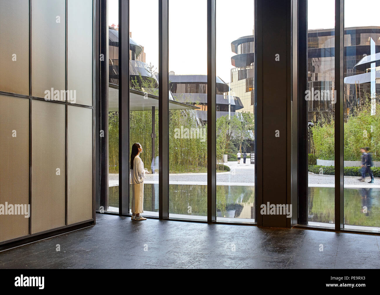 Interior view. Chaoyang Park Plaza, Beijing, China. Architect: MAD ...