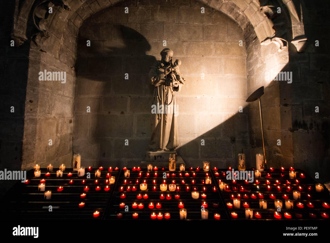 Altar with candles in the Basilica of Saint Nazarius and Celsius in ...