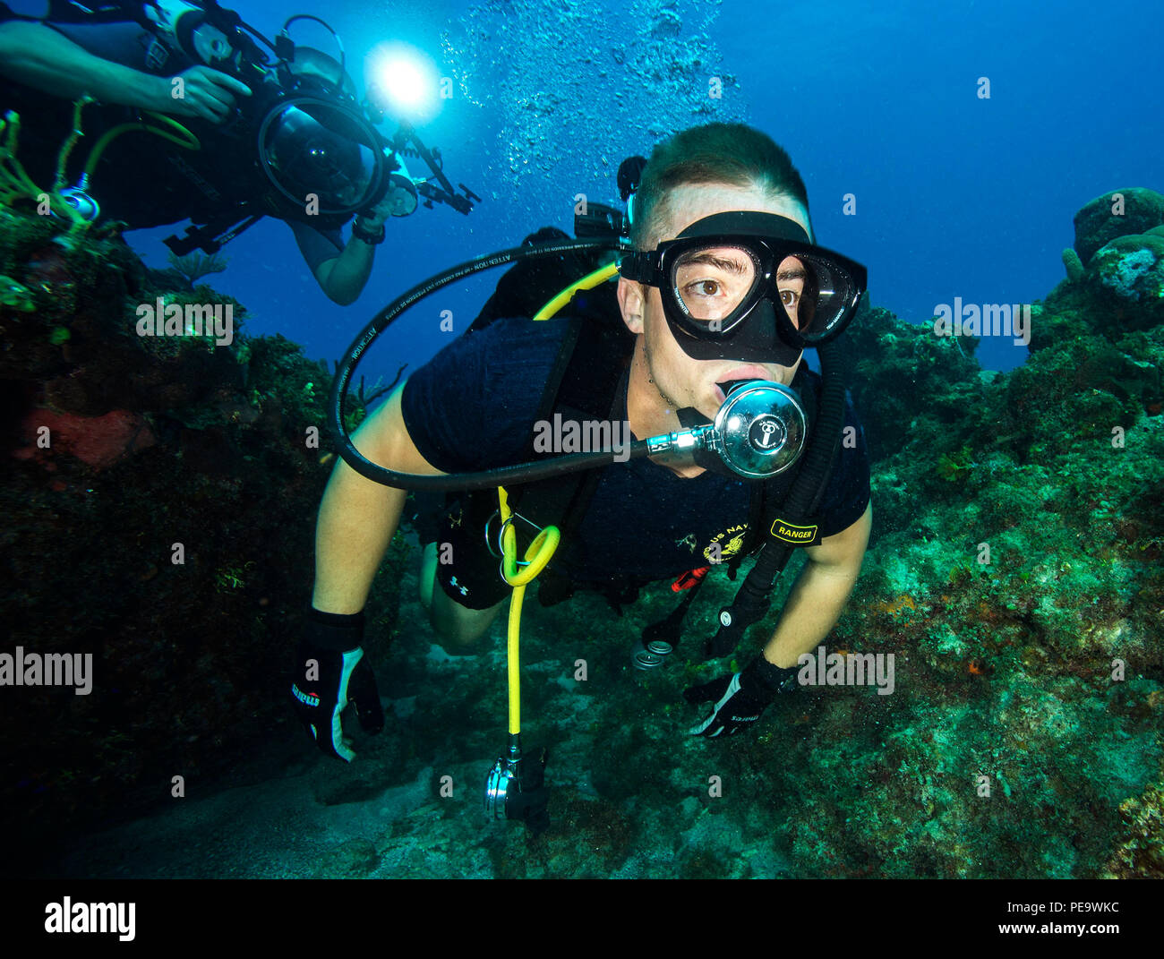 Diver with his underwater cameras hi-res stock photography and images ...