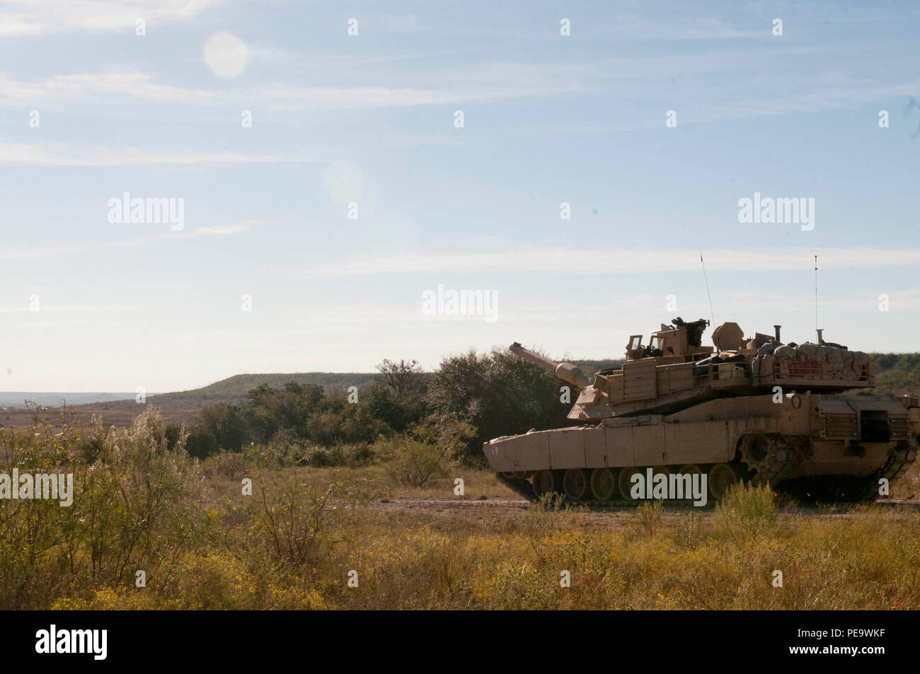 An M1A2 Abrams tank crew with the 1st Battalion, 12th Cavalry Regiment ...