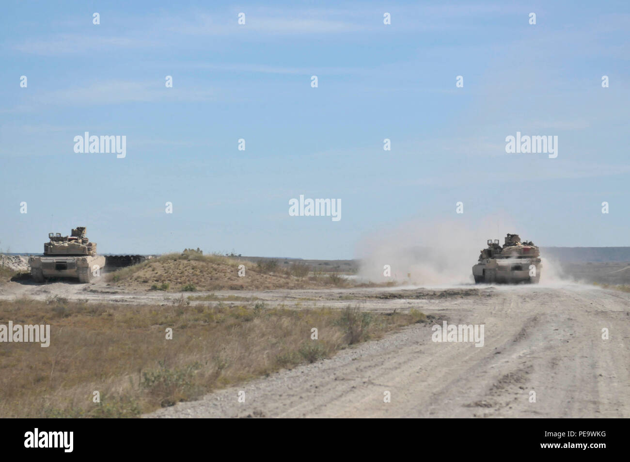 Two M1A2 Abrams tank crews with the 1st Battalion, 12th Cavalry ...