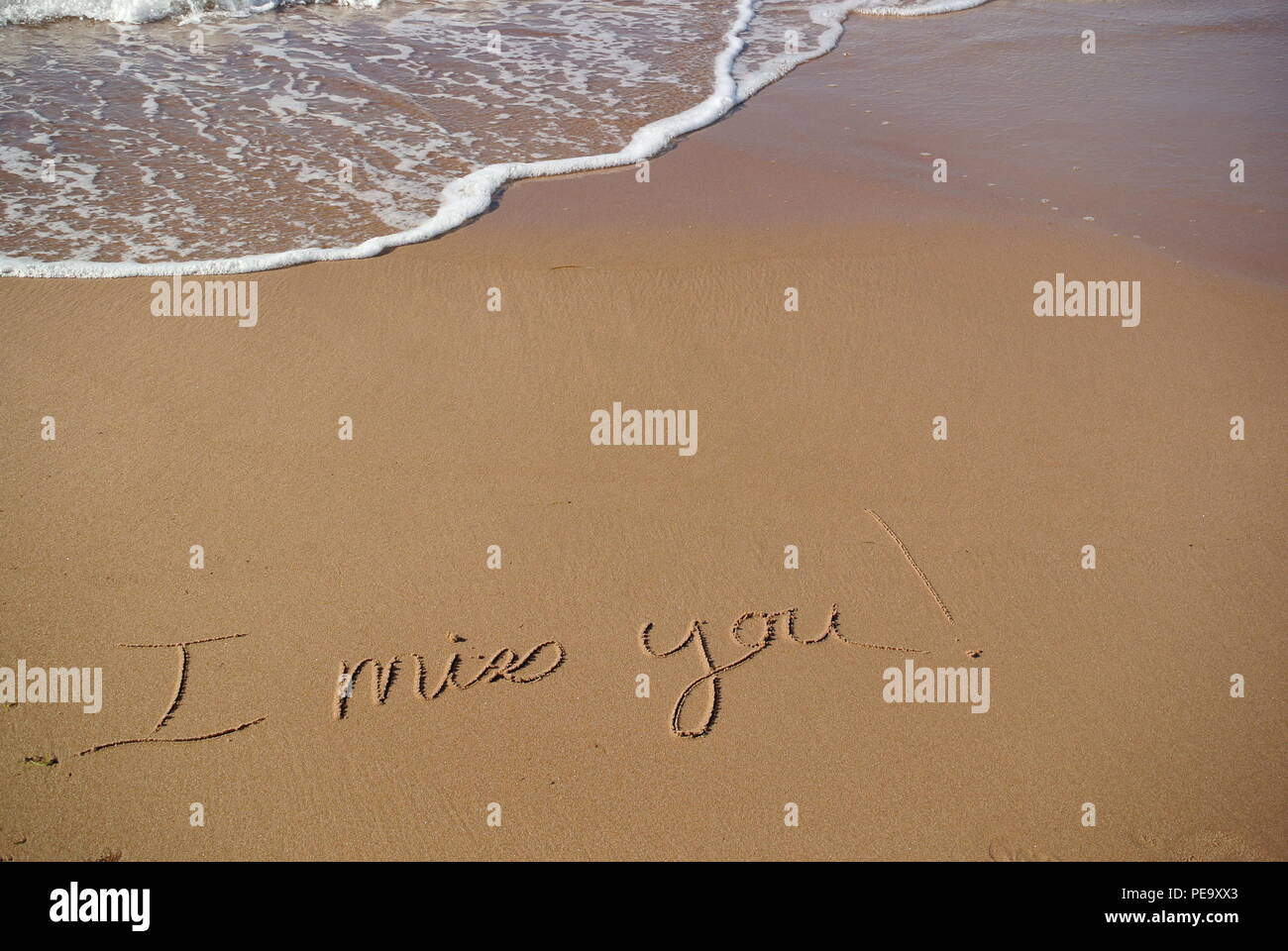 Hand written in sand hi-res stock photography and images - Alamy