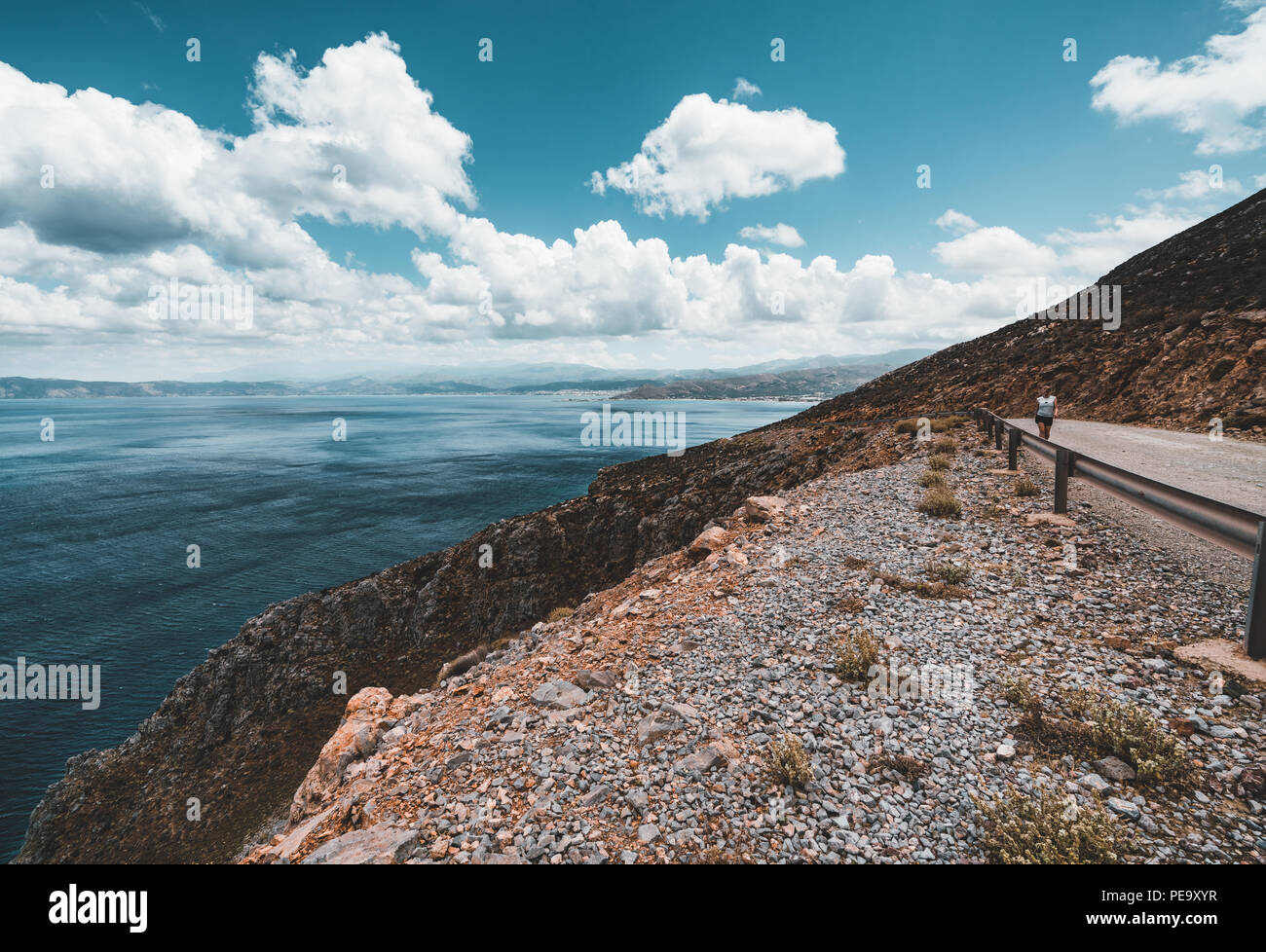 Panoramic view of rocks and beach with sky and clouds in Crete, Greece ...