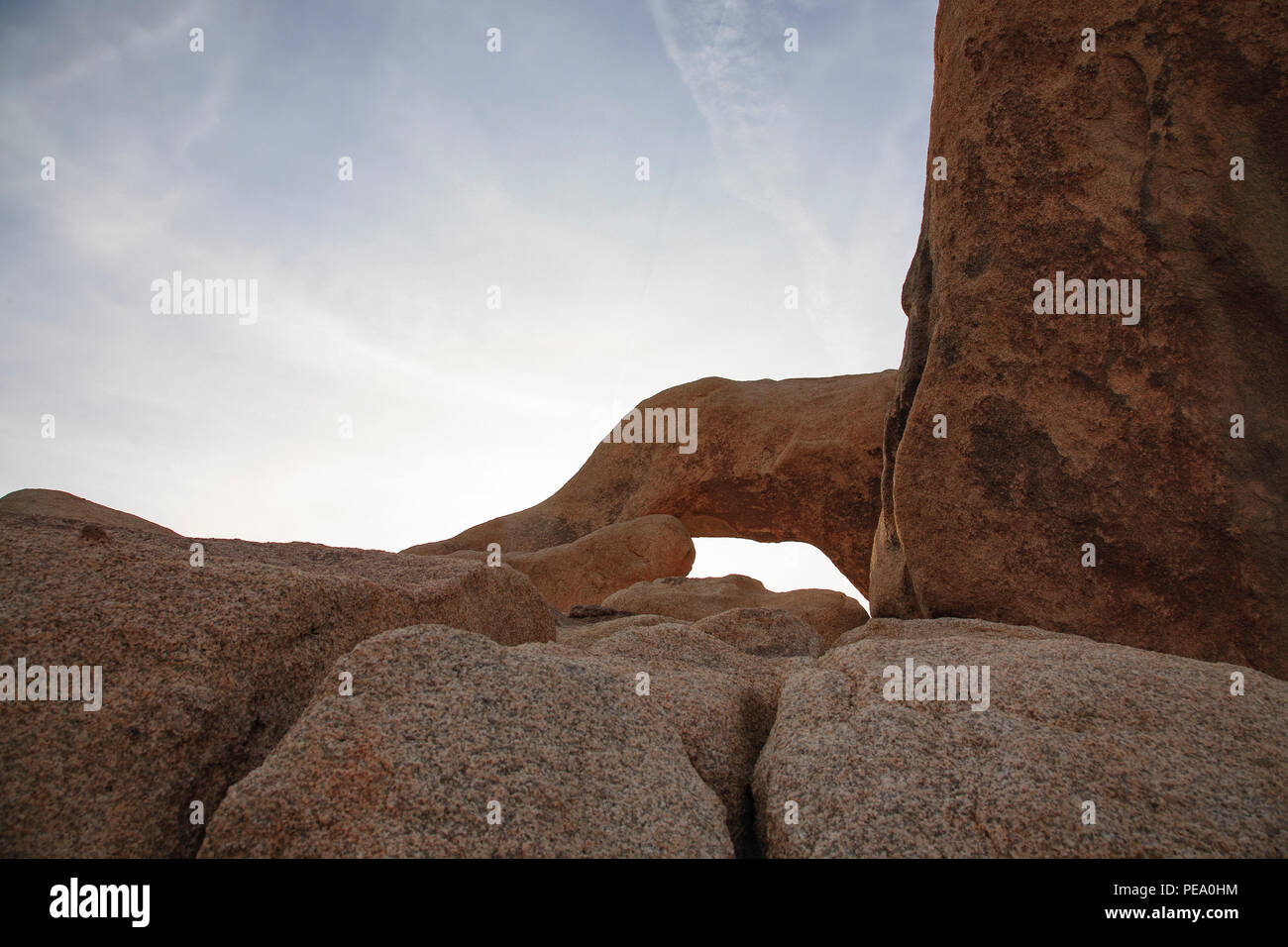 desert boulders and arch Stock Photo - Alamy