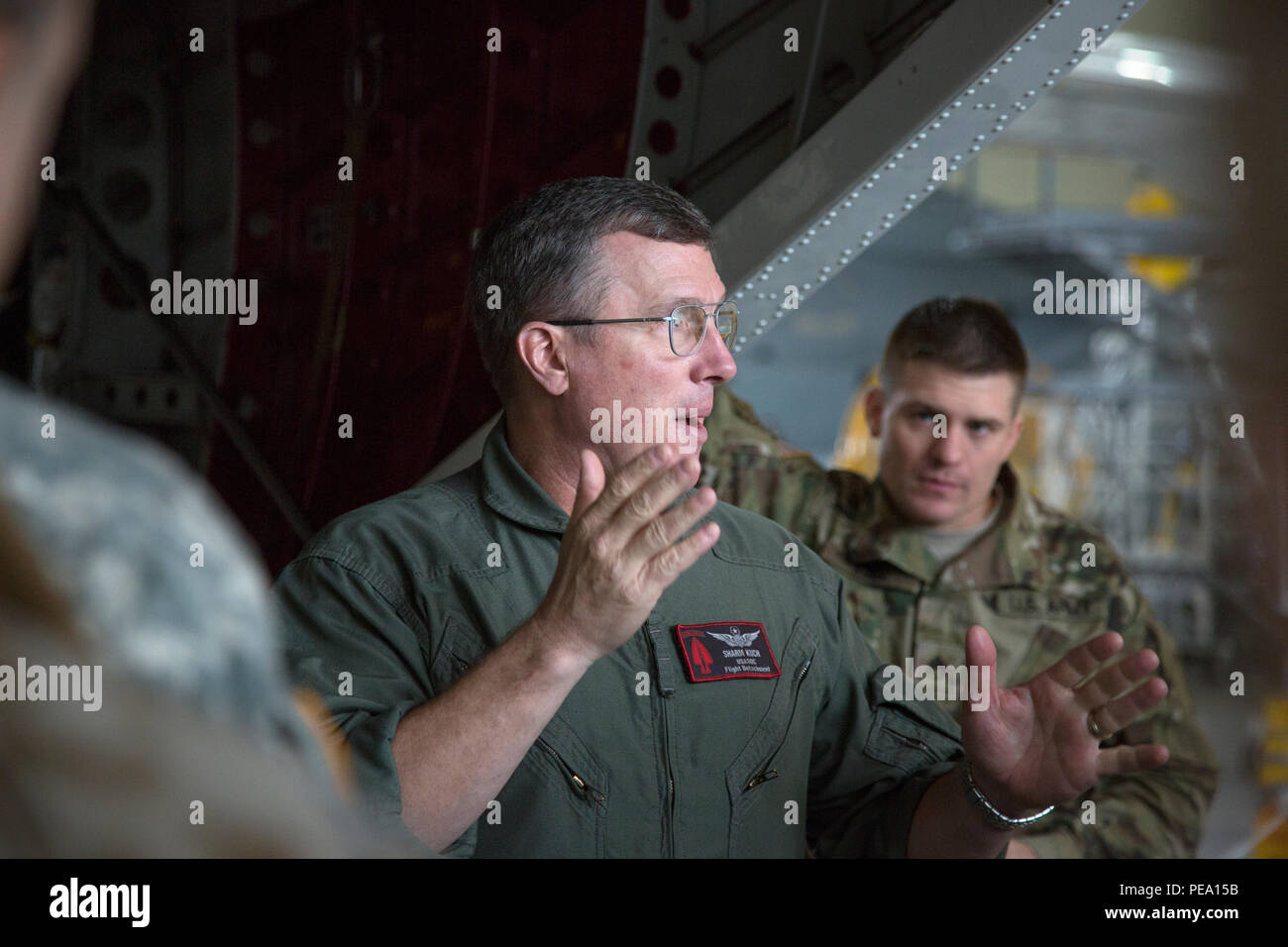 A U.S. jumpmaster briefs U.S. and partner nation paratroopers during ...