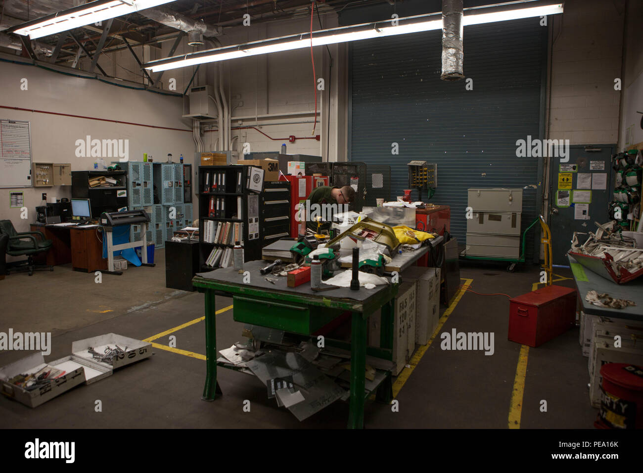 U.S. Marine Corps PFC. Timothy S. Adams, an airframe mechanic assigned ...