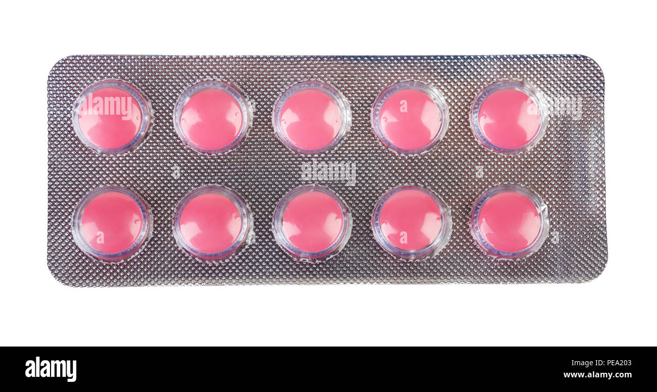 ten pink medical pills packed in a blister pack isolated on white ...