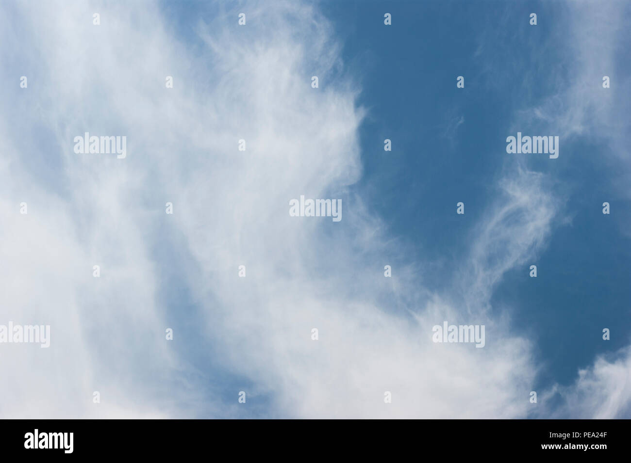 Stratus floccus Clouds in the middle of the day on the sky Stock Photo ...