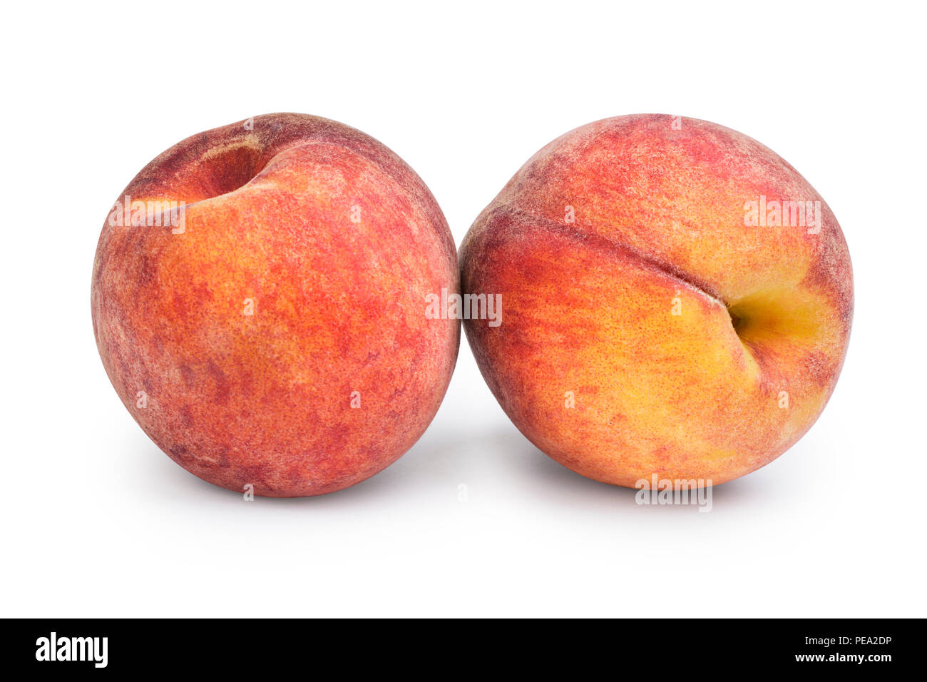 Two ripe fluffy peach isolated on white background Stock Photo - Alamy