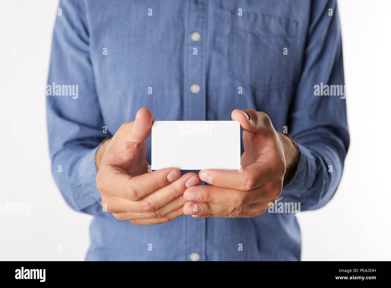 partial view of businessman presenting blank business card isolated on ...