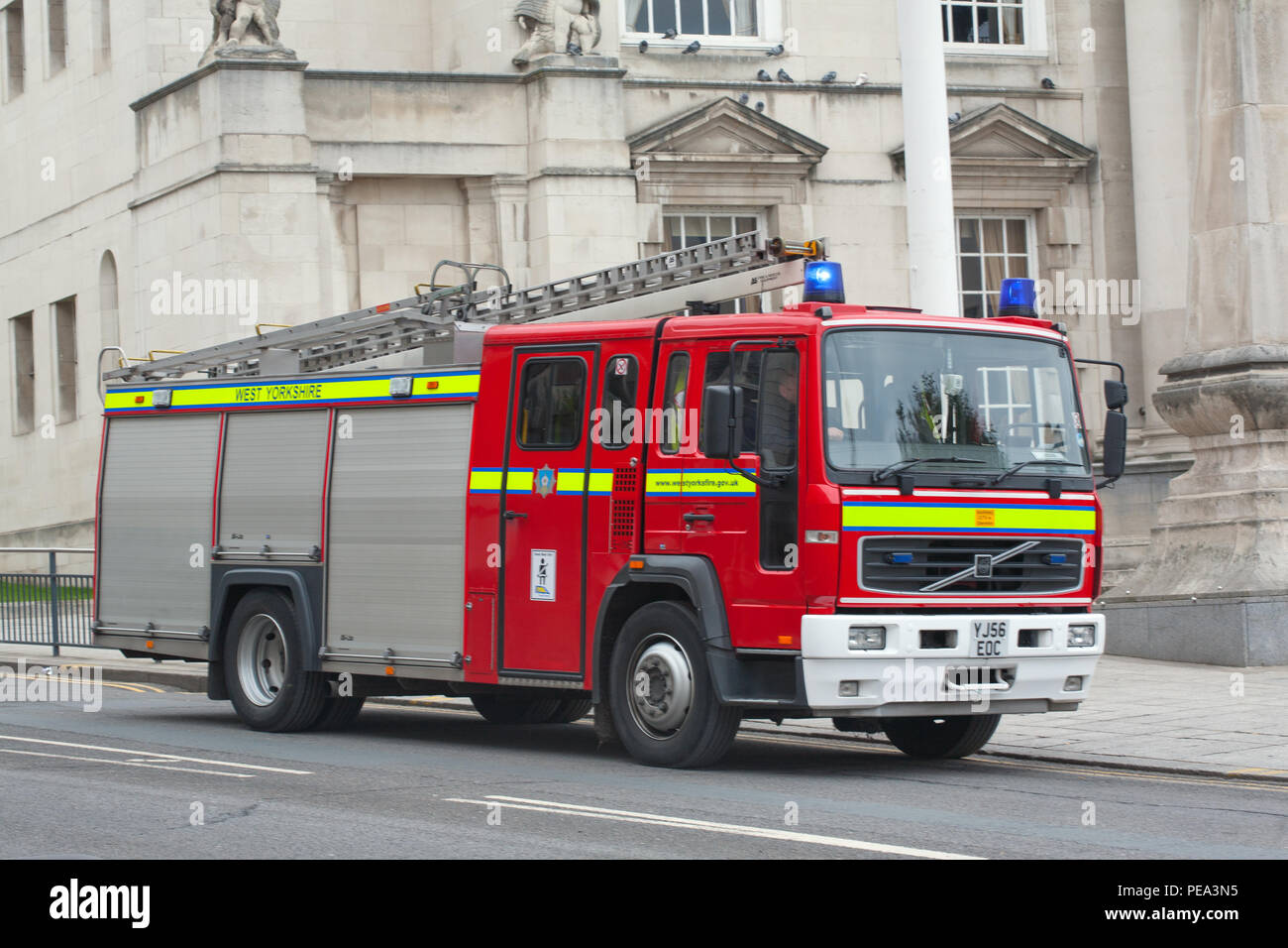 A Fire Engine from West Yorkshire Fire & Rescue passes in front of ...