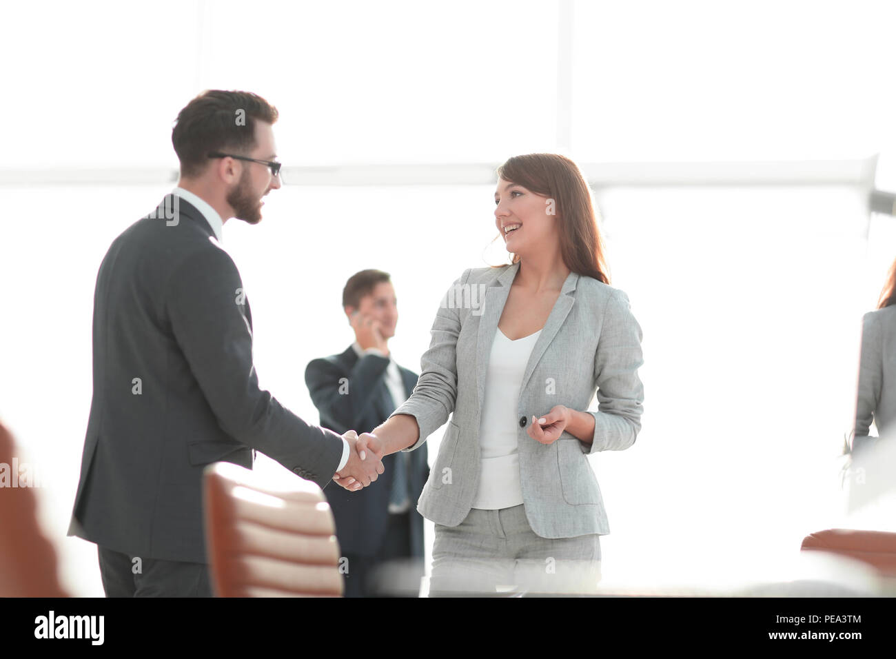 Handshake between manager client hi-res stock photography and images ...