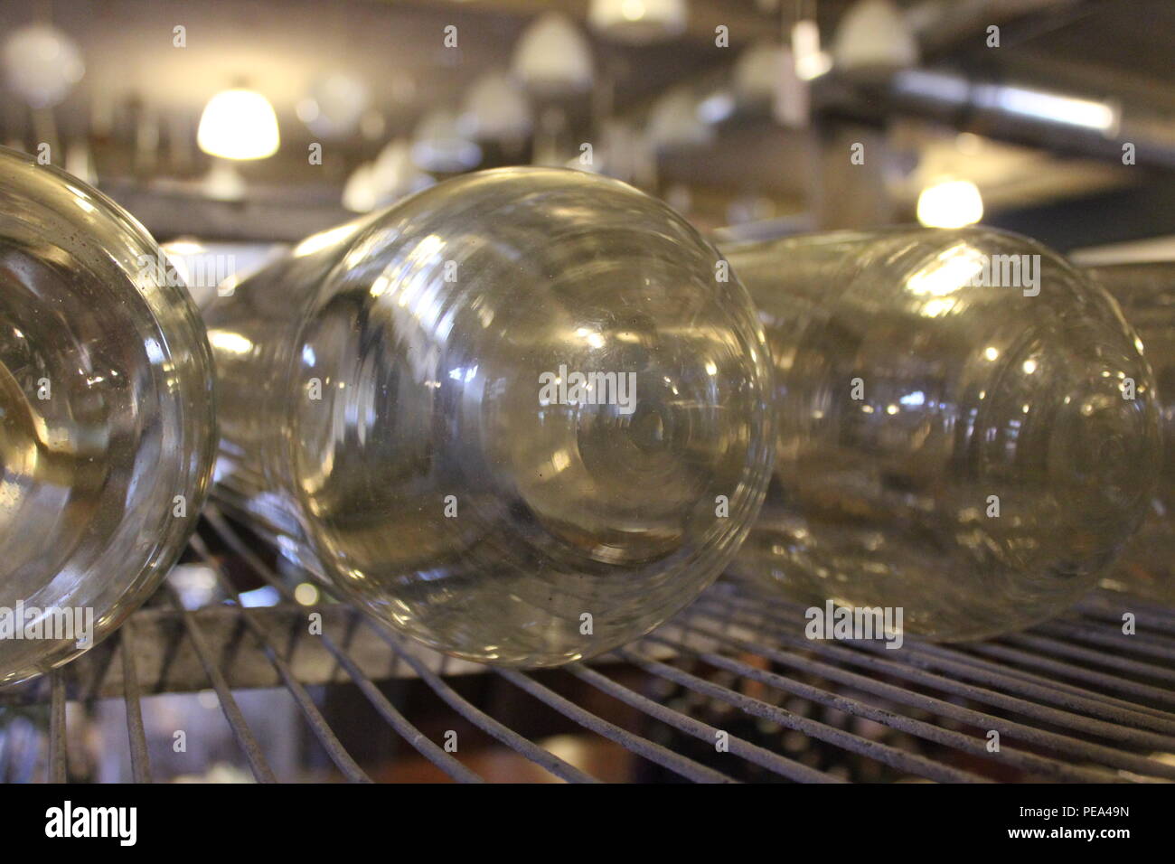 Antique clear glassware stored in a wide rack at Architectural ...