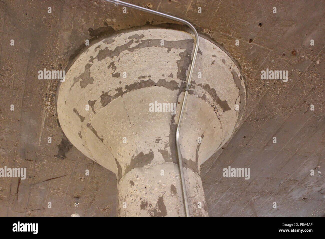 Fully exposed Reinforced concrete column capital in a warehouse at ...