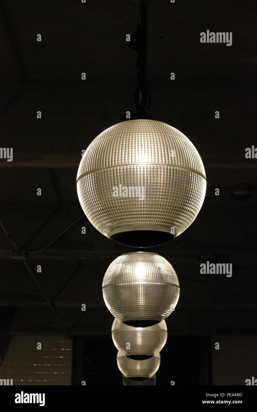 Series of hanging and lit ball lights at Architectural Artifacts in ...