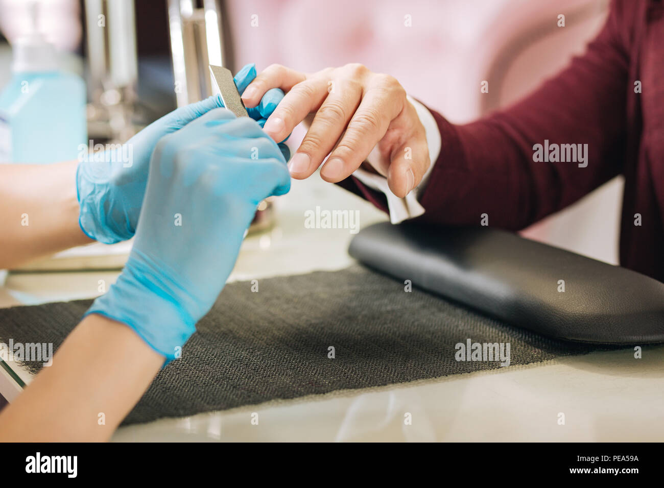 Man getting manicure hi-res stock photography and images - Alamy