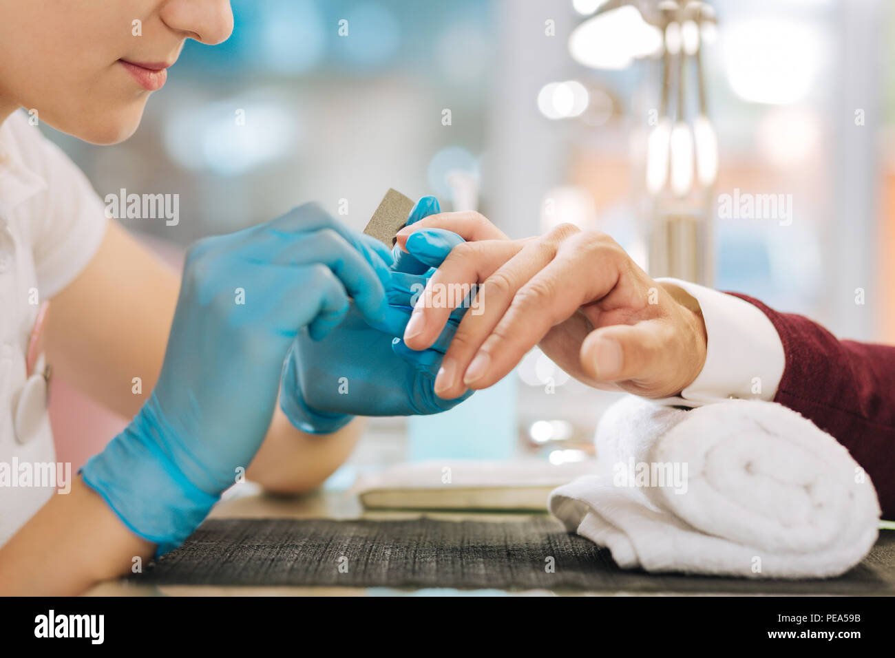 Man getting manicure hi-res stock photography and images - Alamy