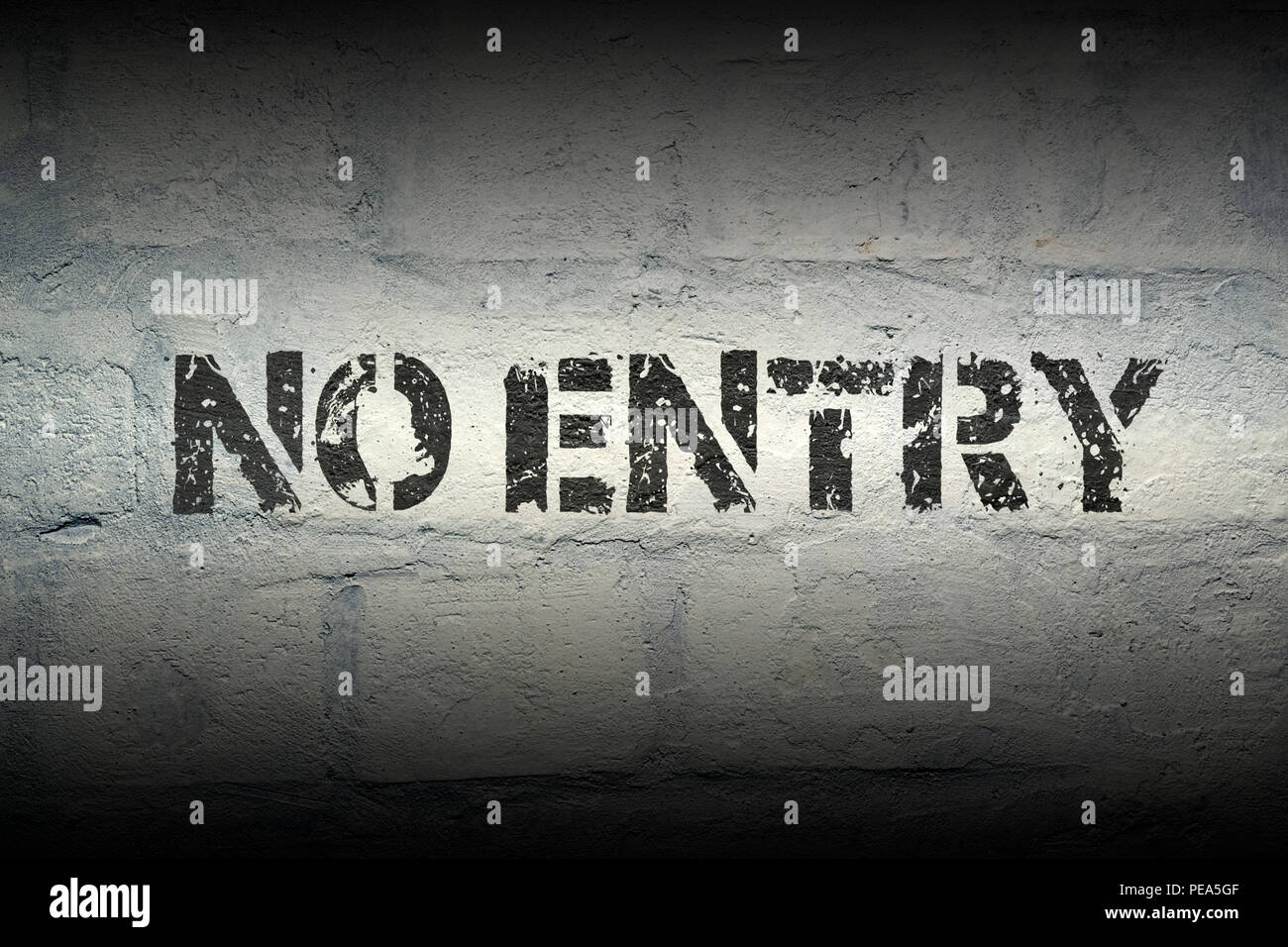 no entry black stencil print on the grunge brick wall with gradient ...