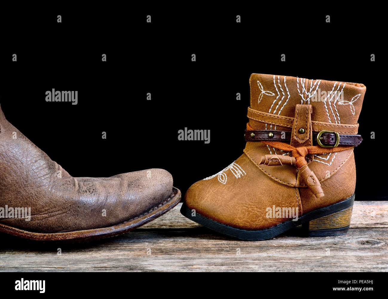 Daddy and baby cowboy with room for your type Stock Photo - Alamy