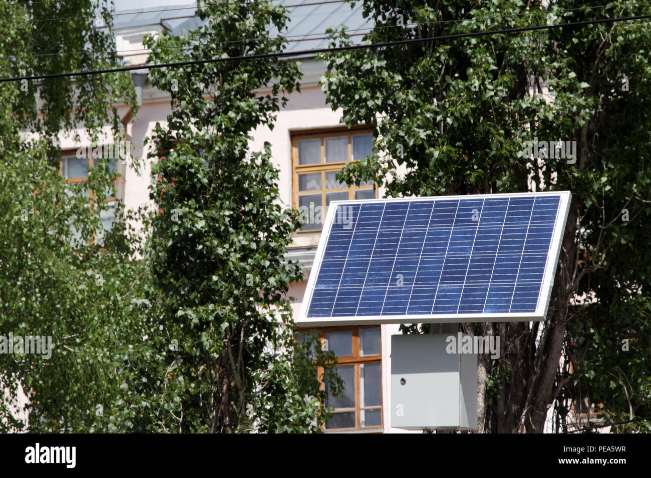 Modern solar battery on the background of a building Stock Photo - Alamy