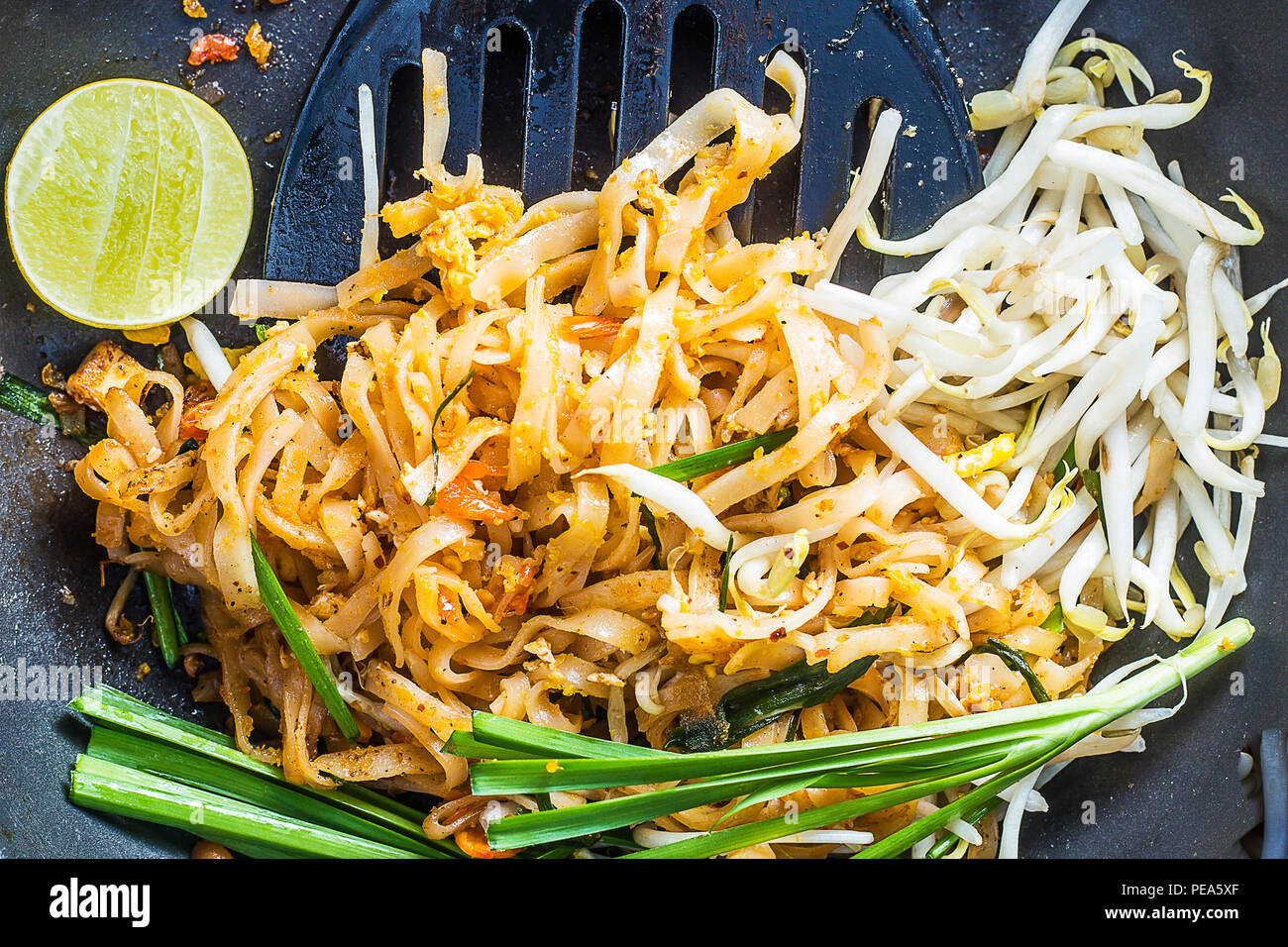 Thai food Padthai hot in pan Stock Photo - Alamy