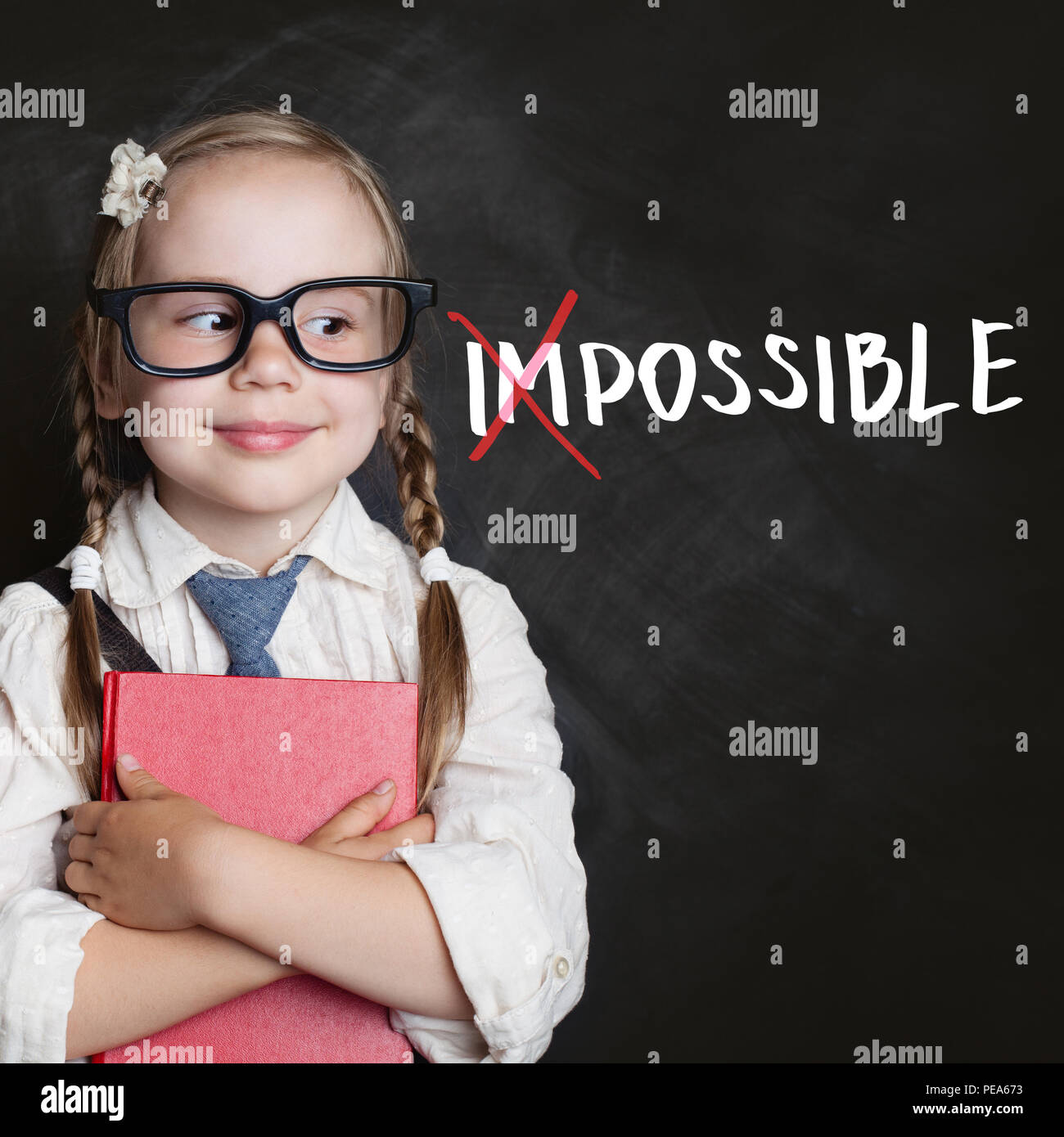 Smart kid with red book and putting a cross over impossible on ...