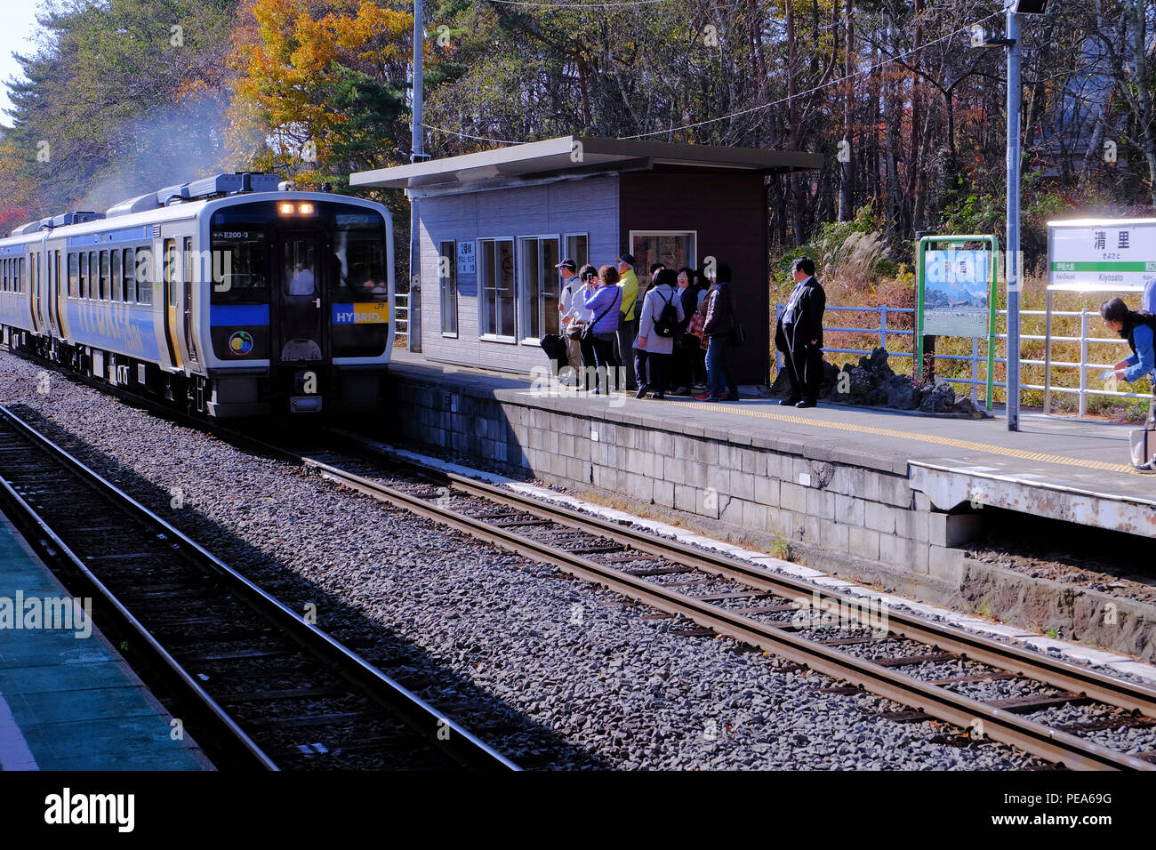 Japanese local train arriving at KIyosato Station Stock Photo - Alamy