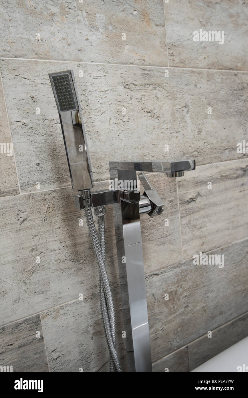 Interior design of a luxury show home bathroom mixer tap with shower ...