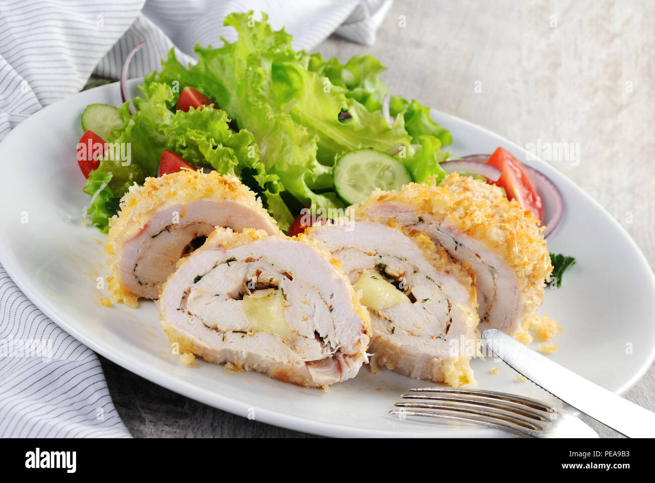 Sliced baked until golden, crispy crust chicken roll in breadcrumbs ...