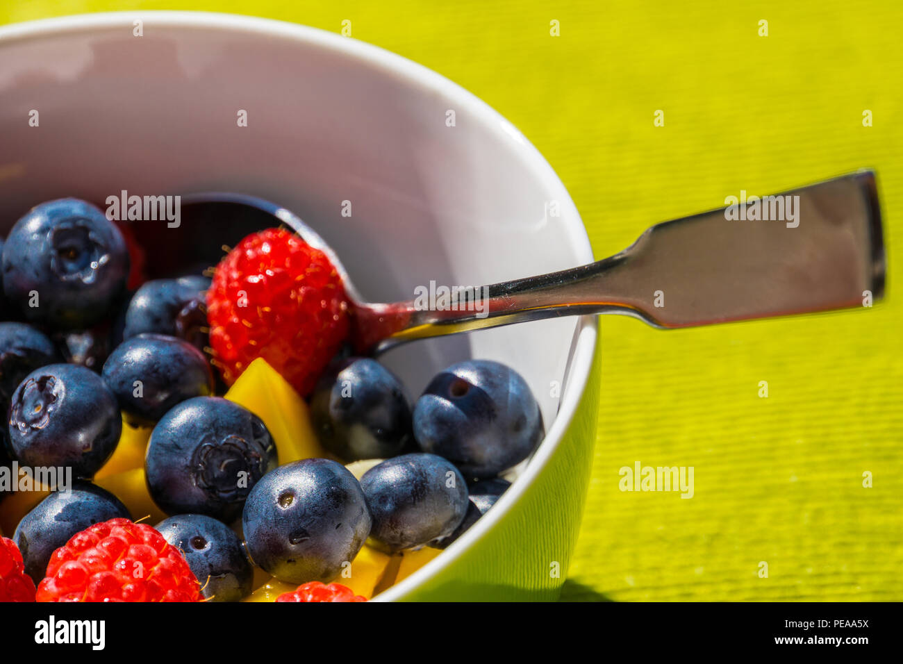 Healthful mix of fruits in summer for refreshment Stock Photo - Alamy