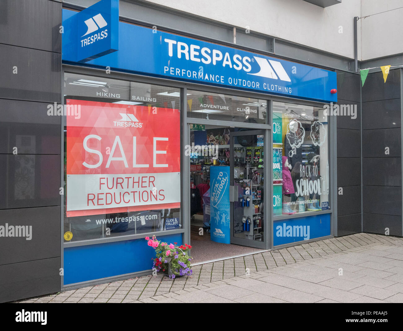 Summer sales sign in Trespass shop window (St. Austell, Cornwall ...
