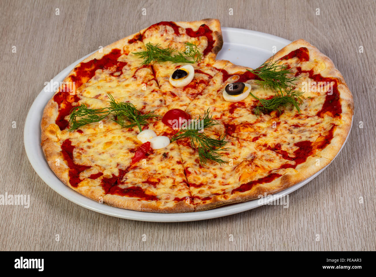 Kids pizza with cheese and tomato Stock Photo - Alamy