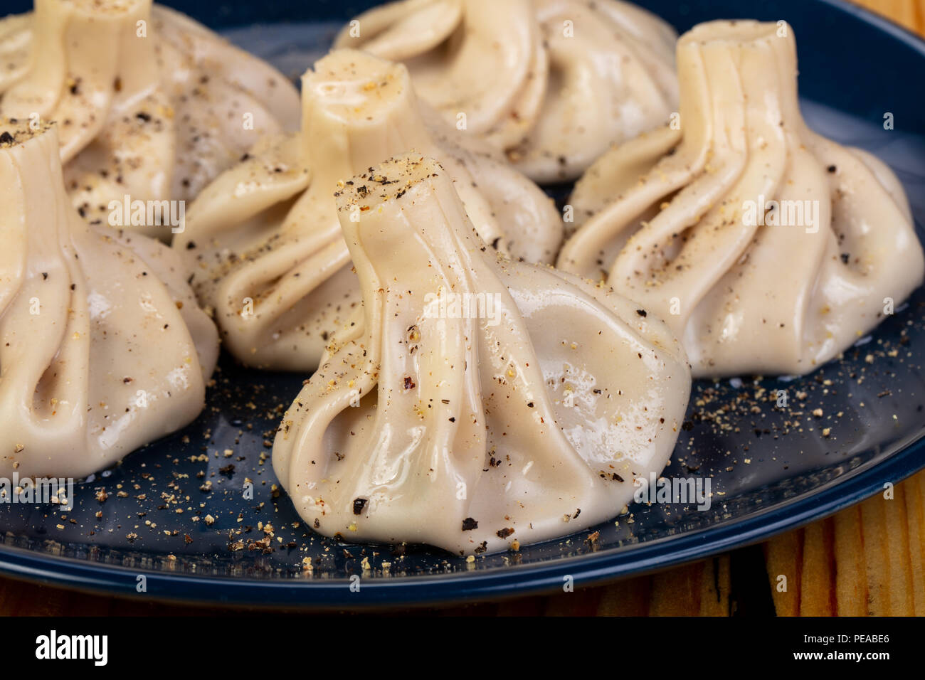 Georgian cuisine - Khinkali with meat Stock Photo - Alamy