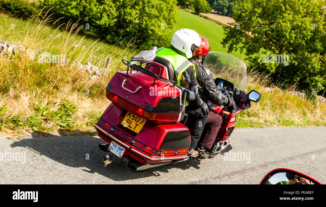 Honda Goldwing motorcycles and riders on the road in the Derbyshire ...