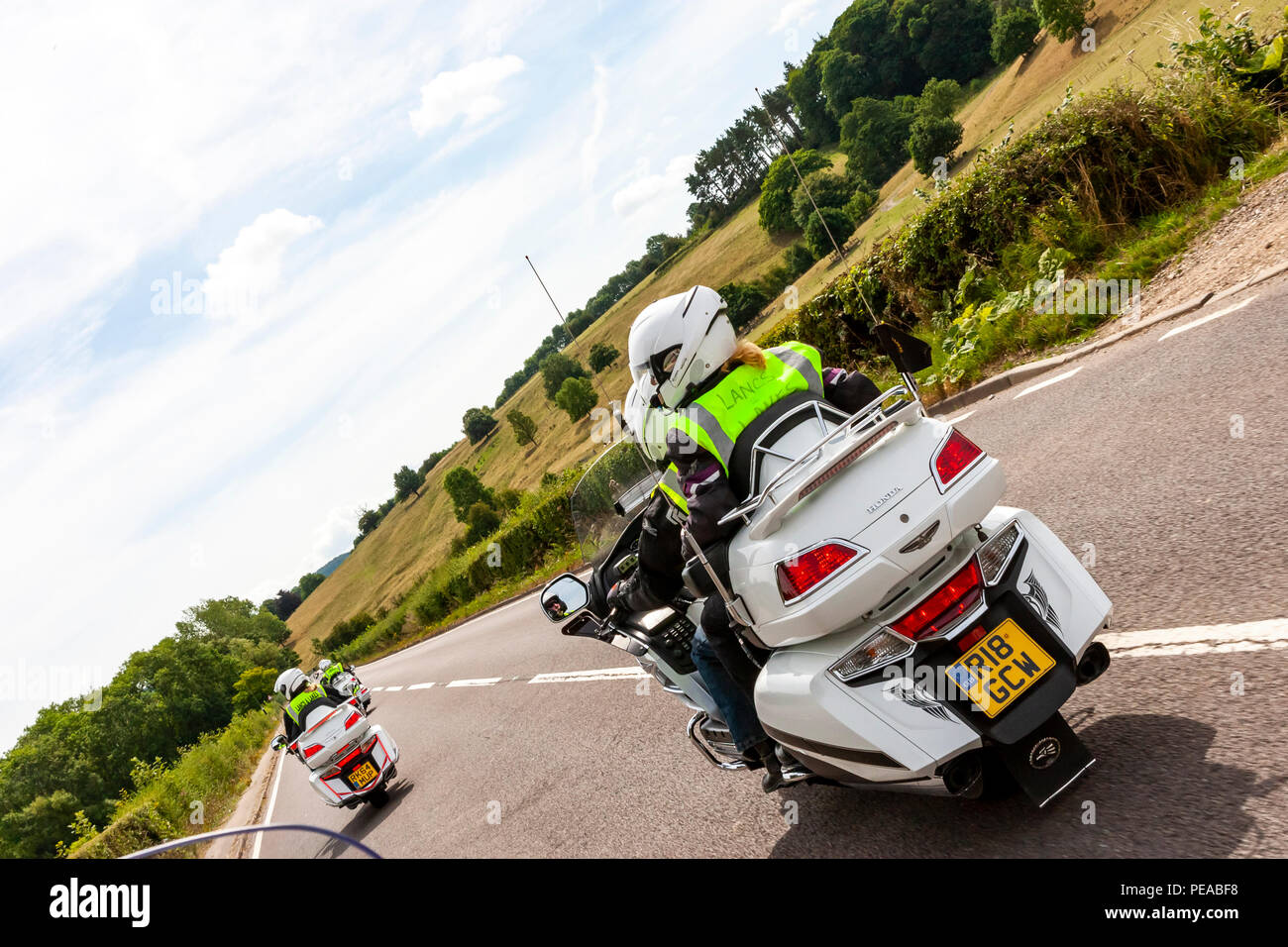 Honda Goldwing motorcycles and riders on the road in the Derbyshire ...