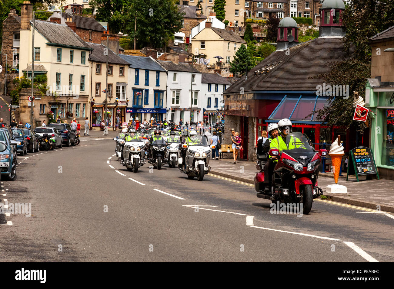 A large group of Honda Goldwing owners ride through Matlock Bath in ...
