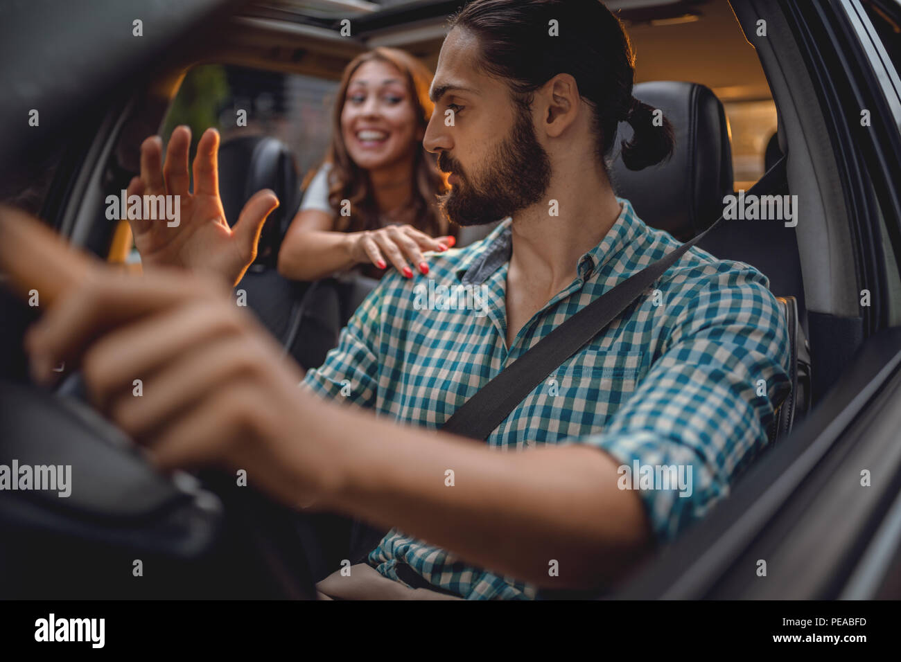 Man tapping woman shoulder hi-res stock photography and images - Alamy