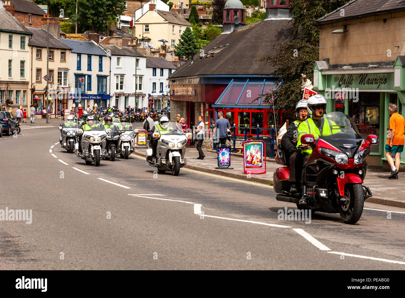A large group of Honda Goldwing owners ride through Matlock Bath in ...