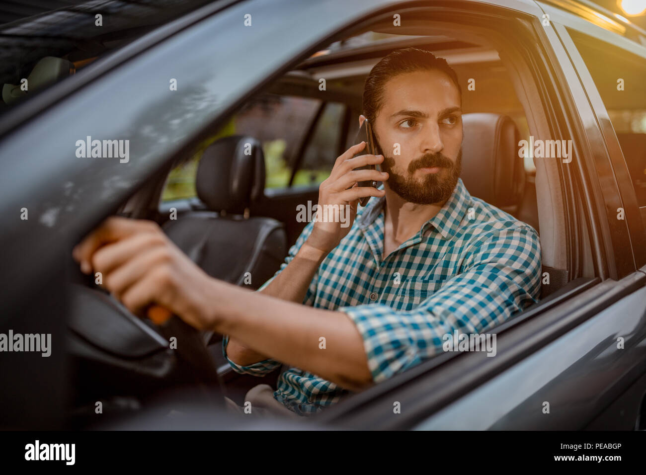 Talking while driving hi-res stock photography and images - Alamy