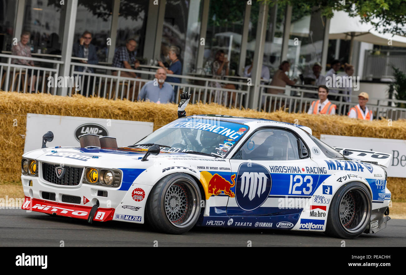 1996 Mazda RX-7 "Madbul" drift car with driver Mike Whiddett at the 2018 Goodwood Festival of ...