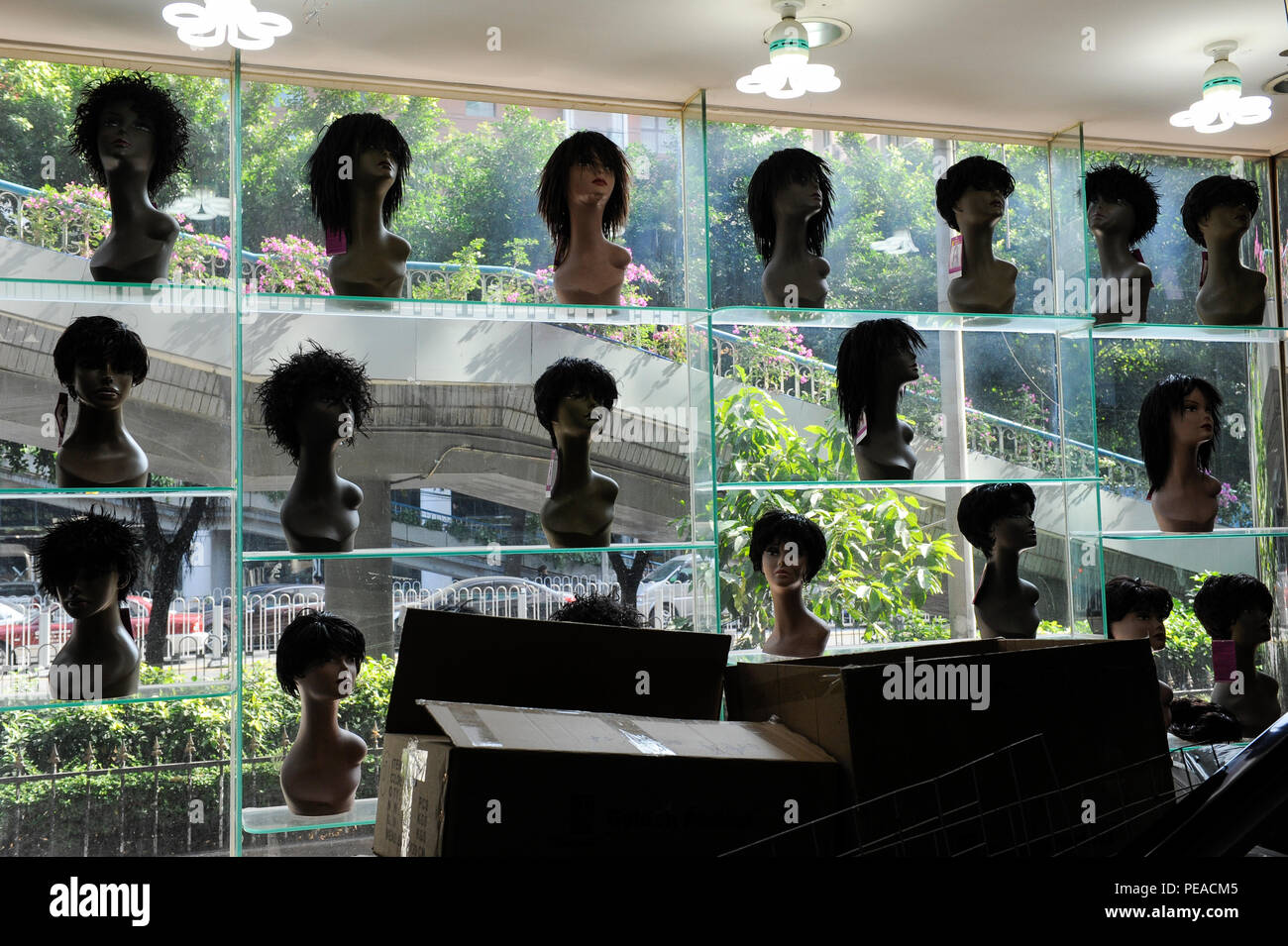 Wig shop window display hair hi-res stock photography and images - Alamy