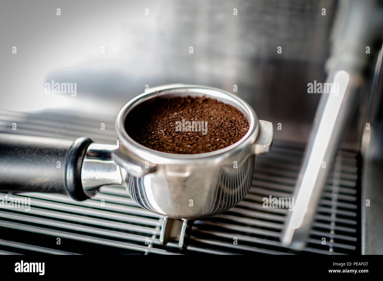 Freshly ground coffee making hi-res stock photography and images - Alamy