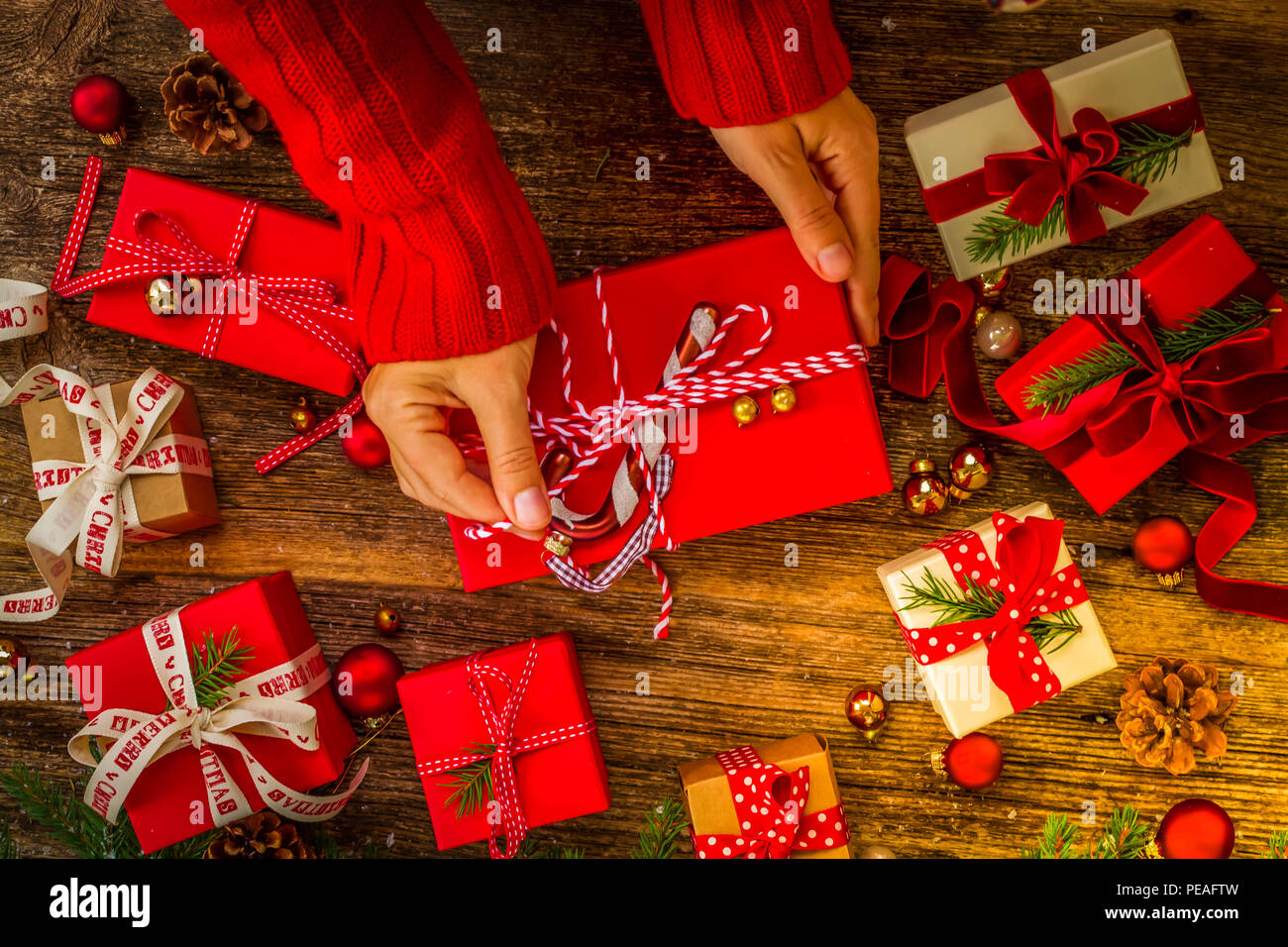 Christmas gift giving Stock Photo - Alamy