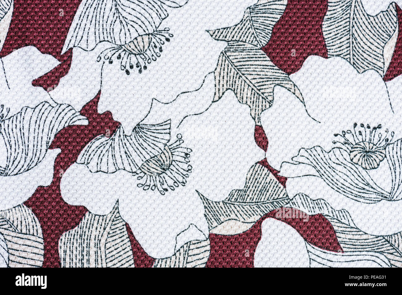 full frame image of textile fabric with pattern of flowers background ...