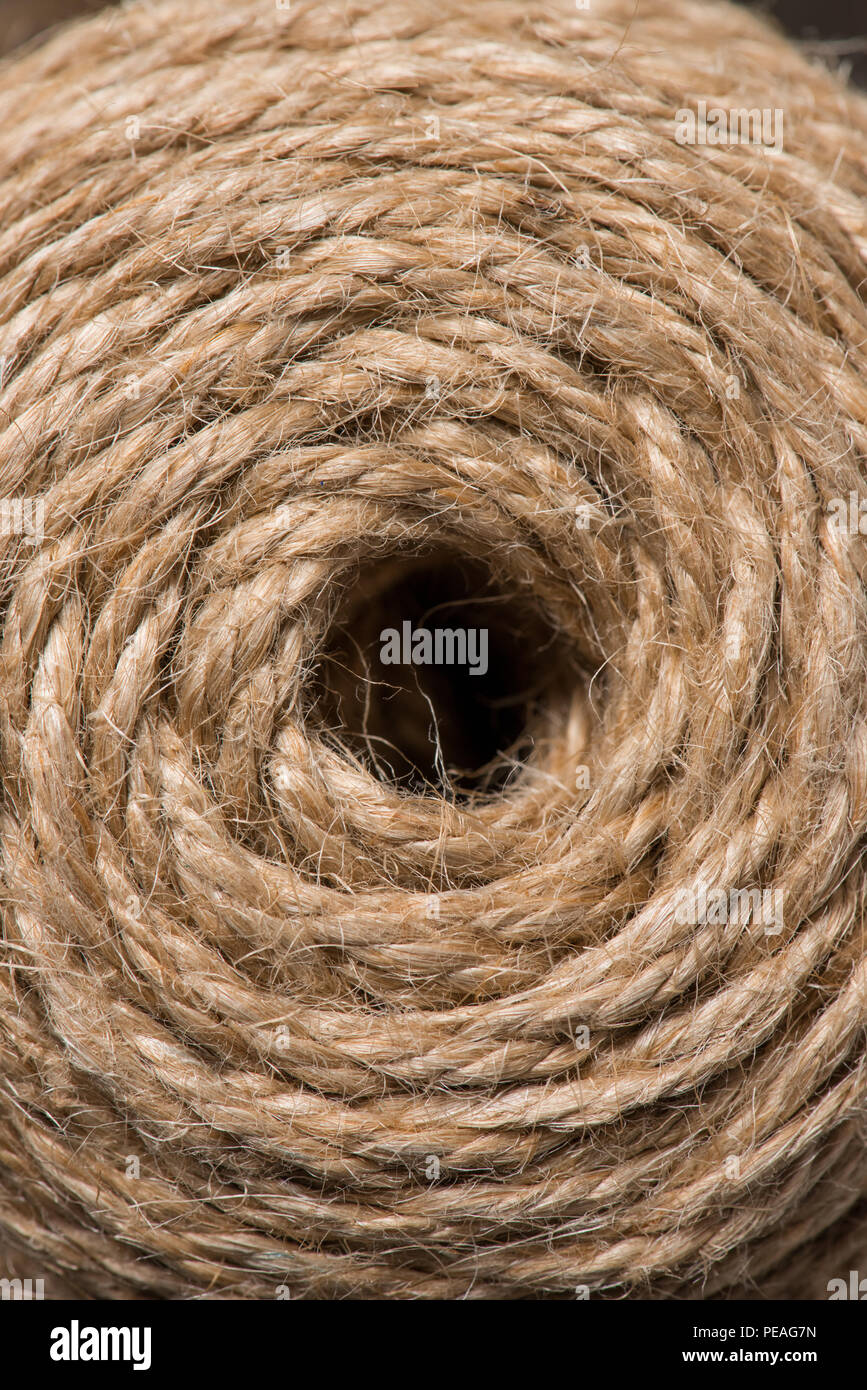 full frame image of circle made by beige string background Stock Photo ...