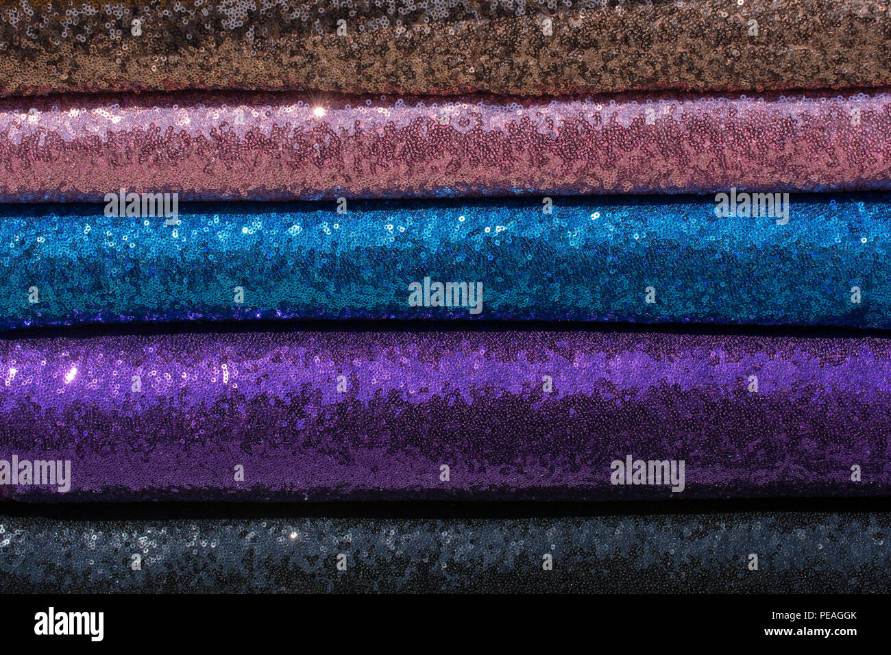 Examples of bright fabric of various color in view Stock Photo - Alamy